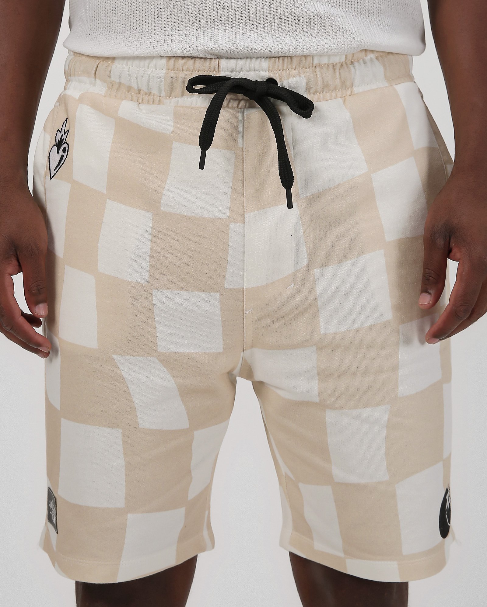 Riachuelo | Bermuda de moletom masculina xadrez Smiley Ana Strumpf bege | The Smiley Company