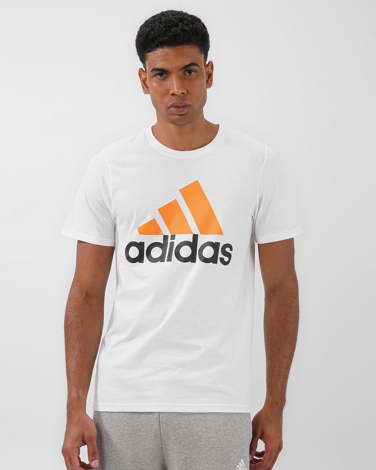 Riachuelo | Camiseta masculina Badge of Sport HH9024 branca | Adidas