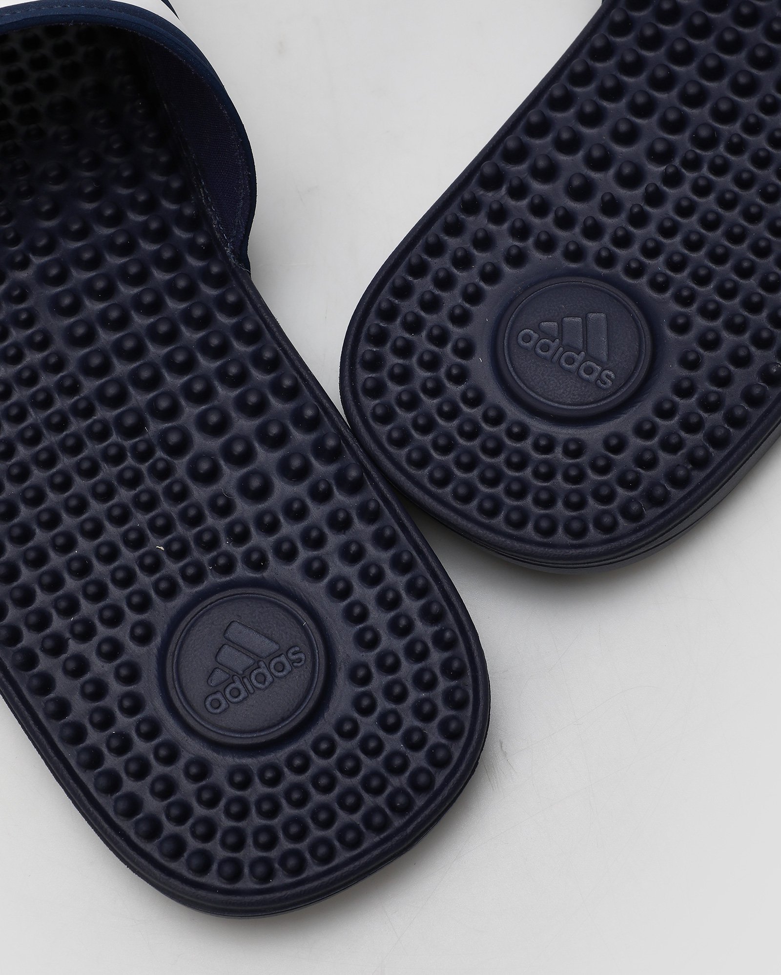Riachuelo | Chinelo slide unissex Adissage F35579 azul | Adidas
