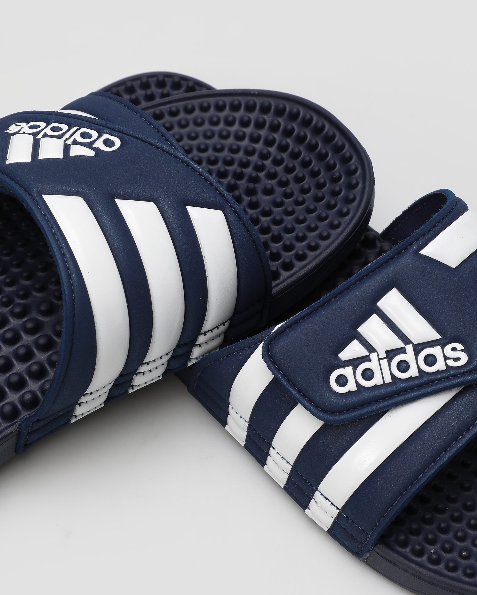Riachuelo | Chinelo slide unissex Adissage F35579 azul | Adidas