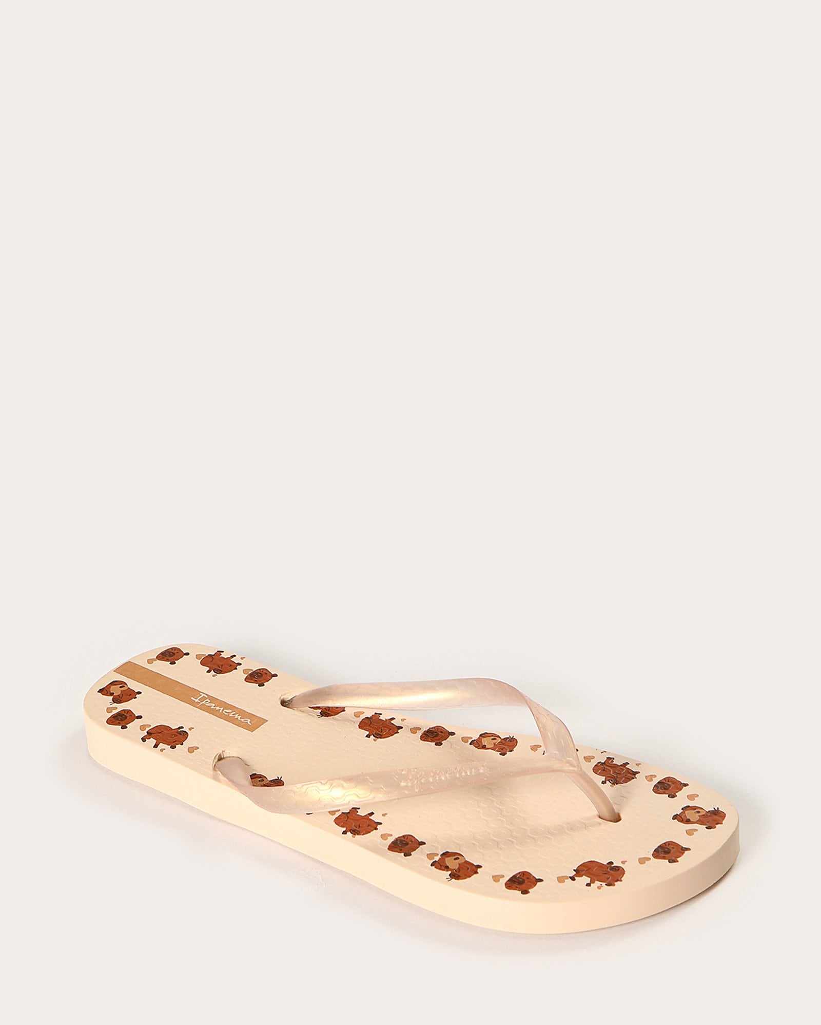 Riachuelo | Chinelo feminino slim estampa Capivara - bege | Ipanema